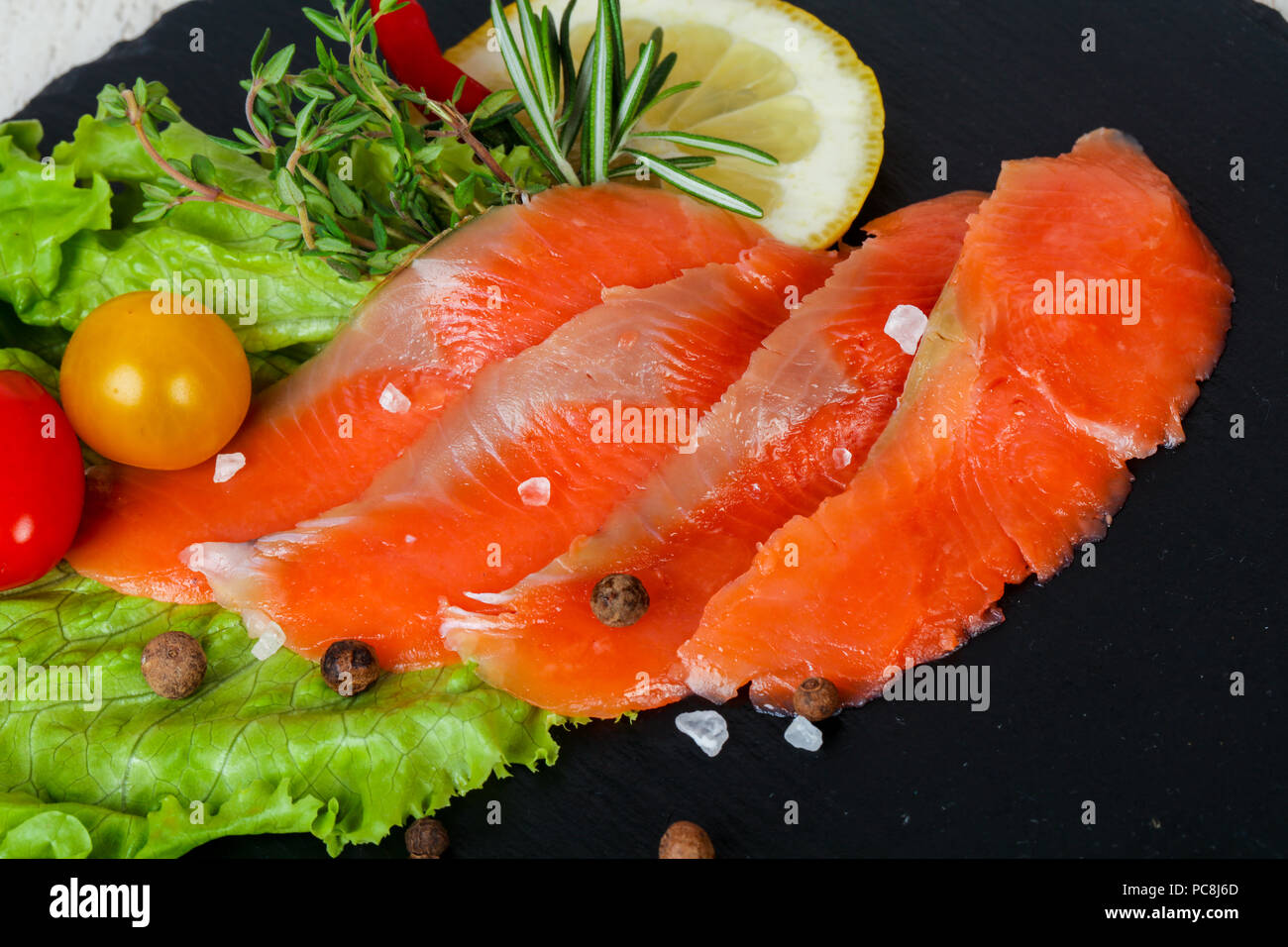 Raw trout fillet with salt and spices Stock Photo - Alamy