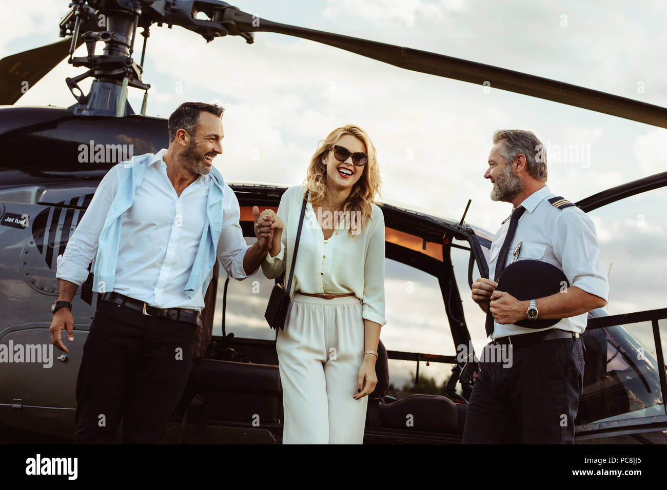 Man escorting woman hi-res stock photography and images - Alamy