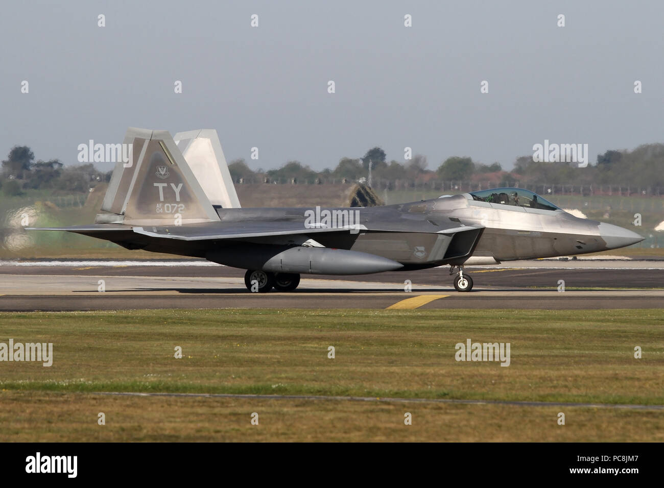 F-22A Raptor taxiing to the main runway at RAF Lakenheath during the ...