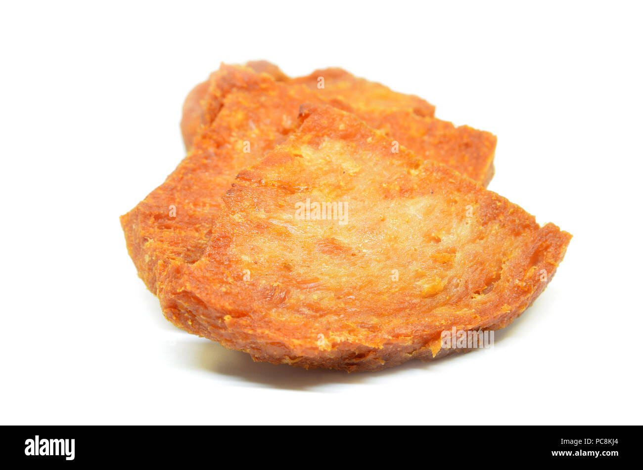 Pan fried slices of luncheon meat isolated on white background Stock ...