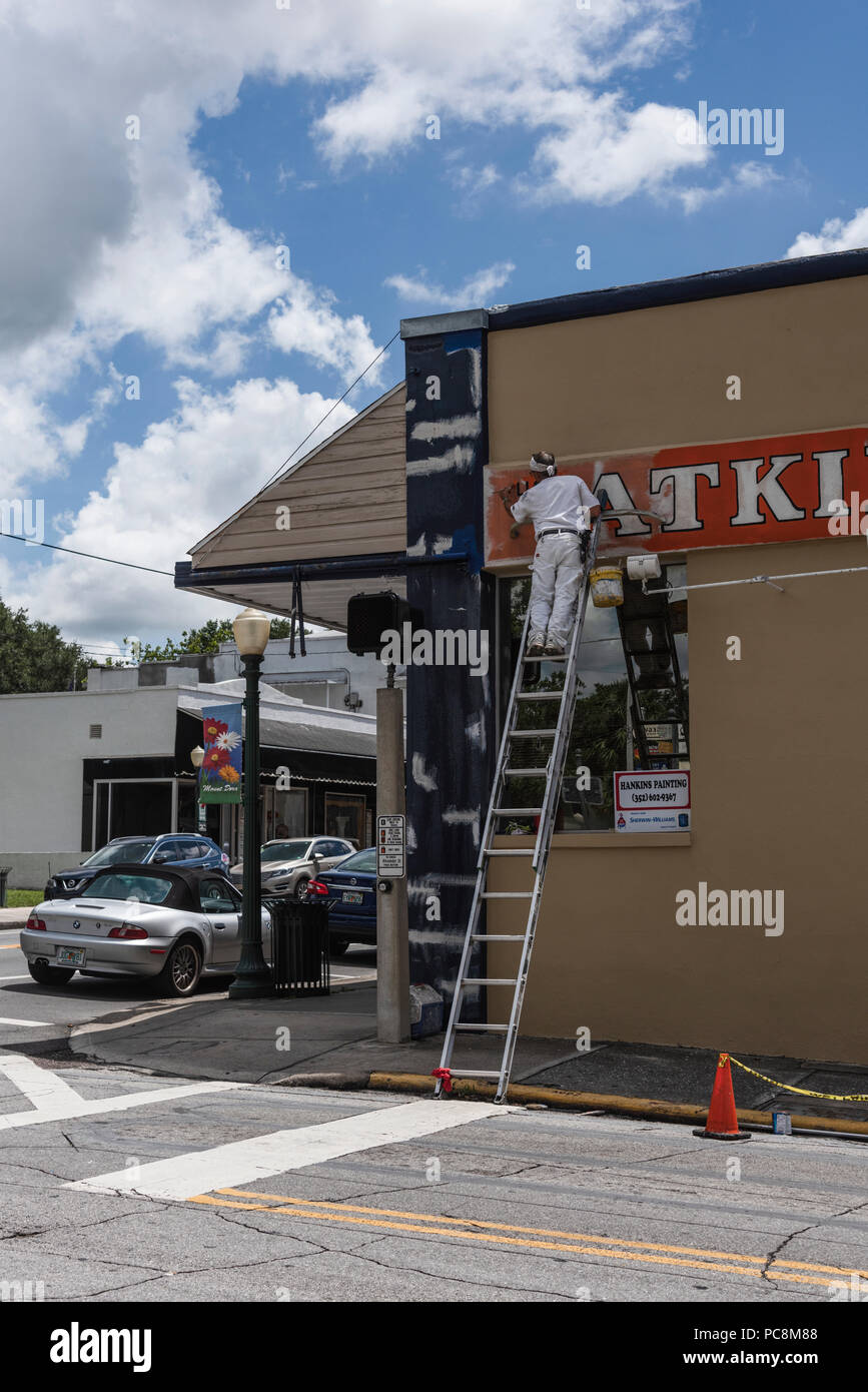Painter on ladder hi-res stock photography and images - Alamy