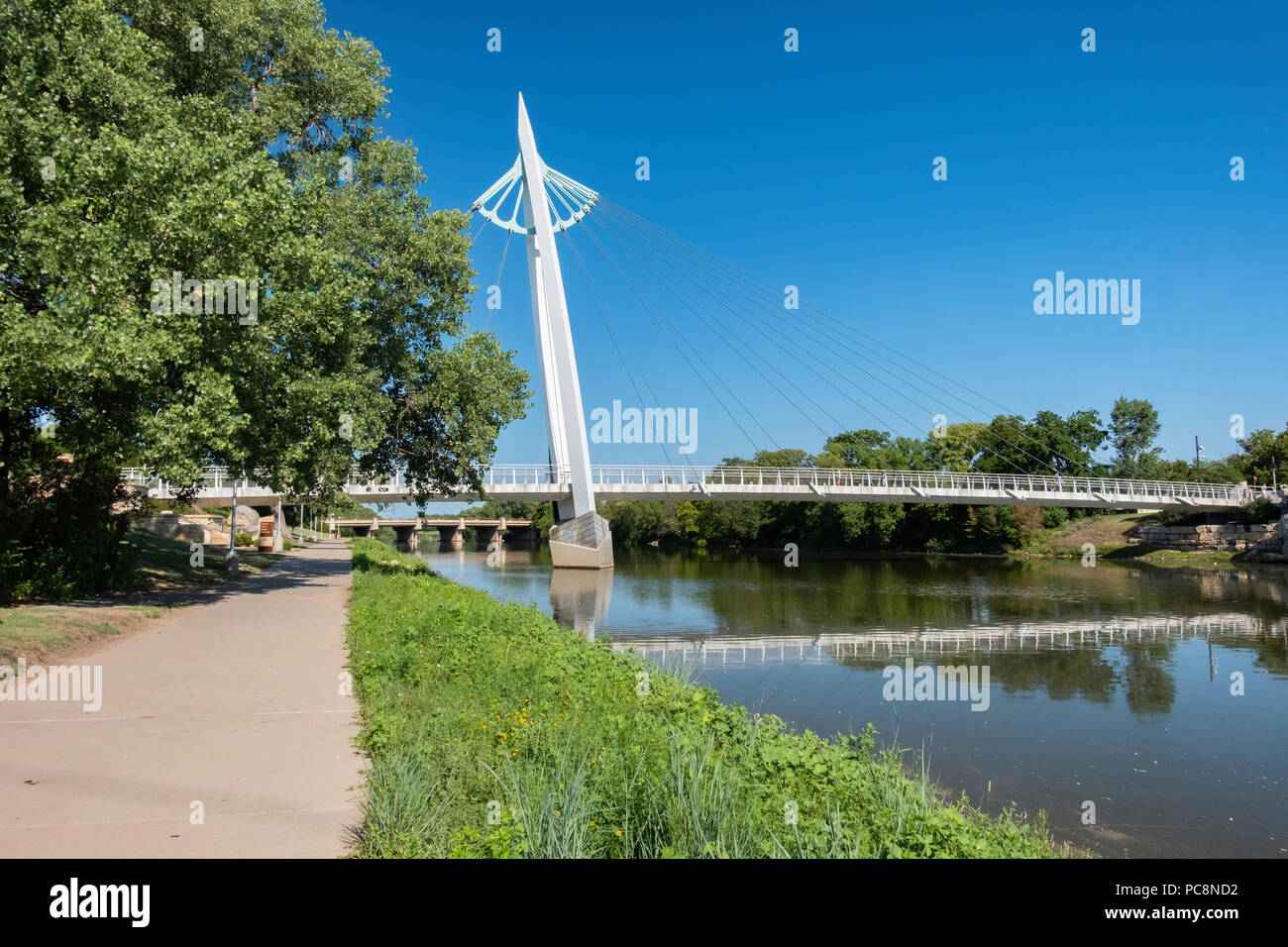 The pedestrian suspension bridge near a popular tourist attraction near ...