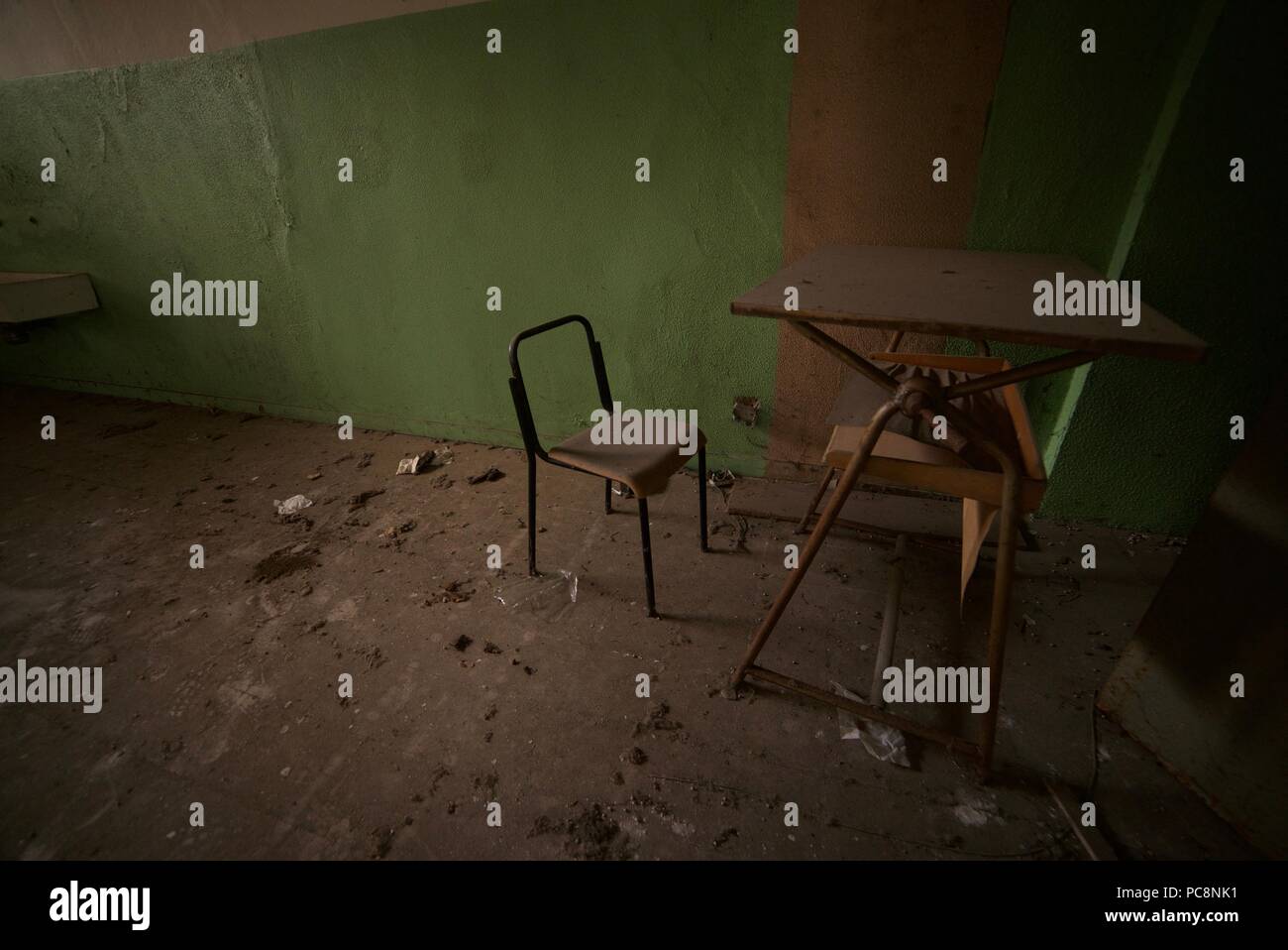 Old victorian school desk and chair inside a classroom of an old ...