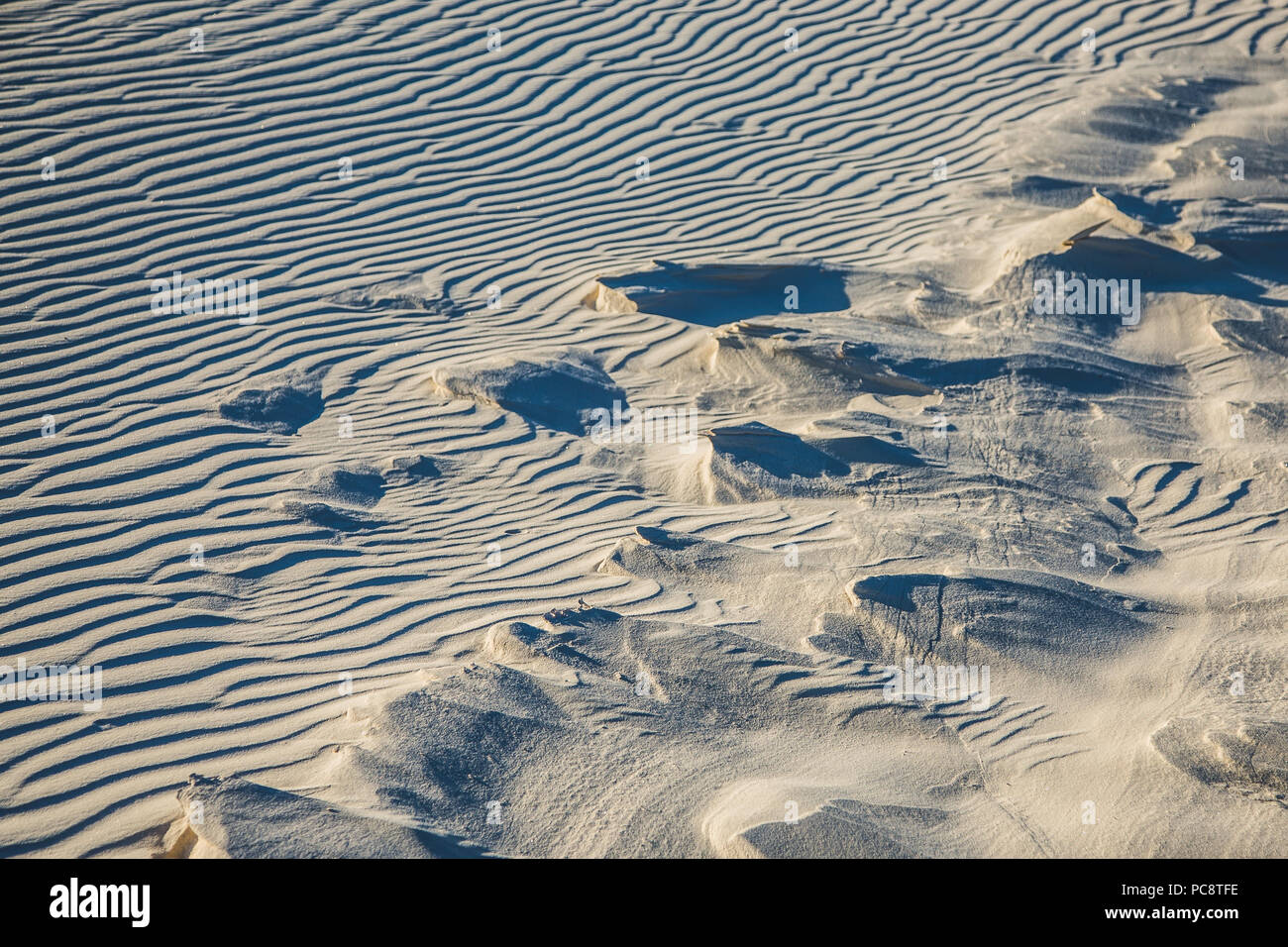 Abstract sand formations in white gypsum sand Stock Photo - Alamy