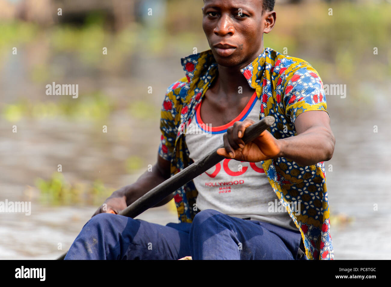 GANVIE, BENIN - JAN 11, 2017: Unidentified Beninese man sails in a ...
