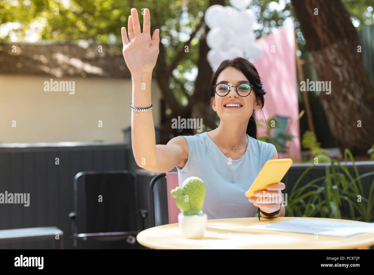 Restaurant customer calling waiter hi-res stock photography and images ...