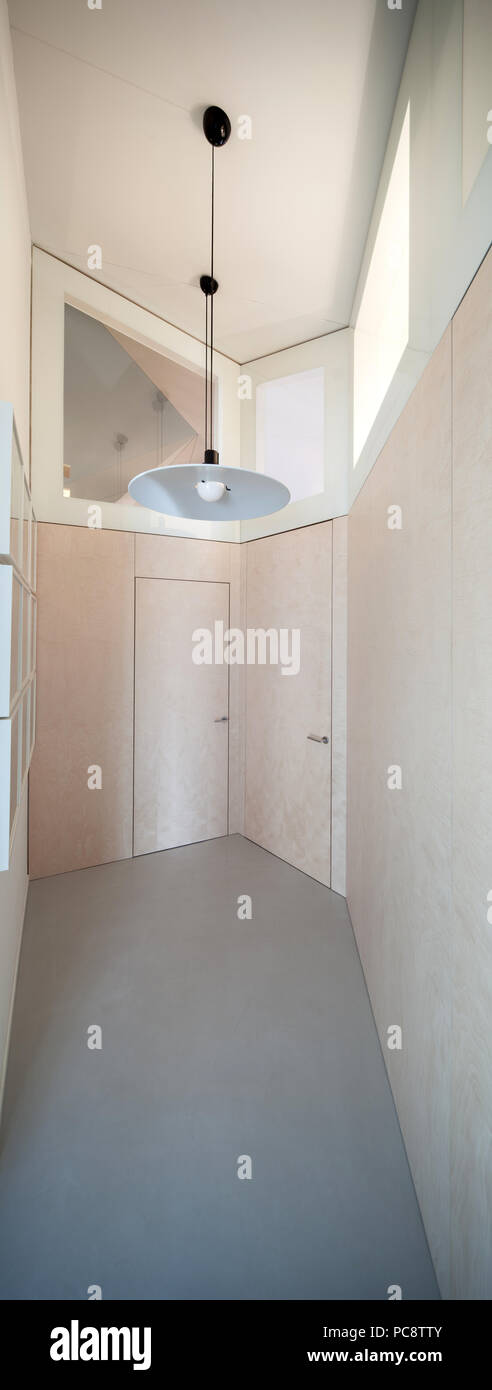Luxury apartment, passage with closed doors and modern lamp Stock Photo ...