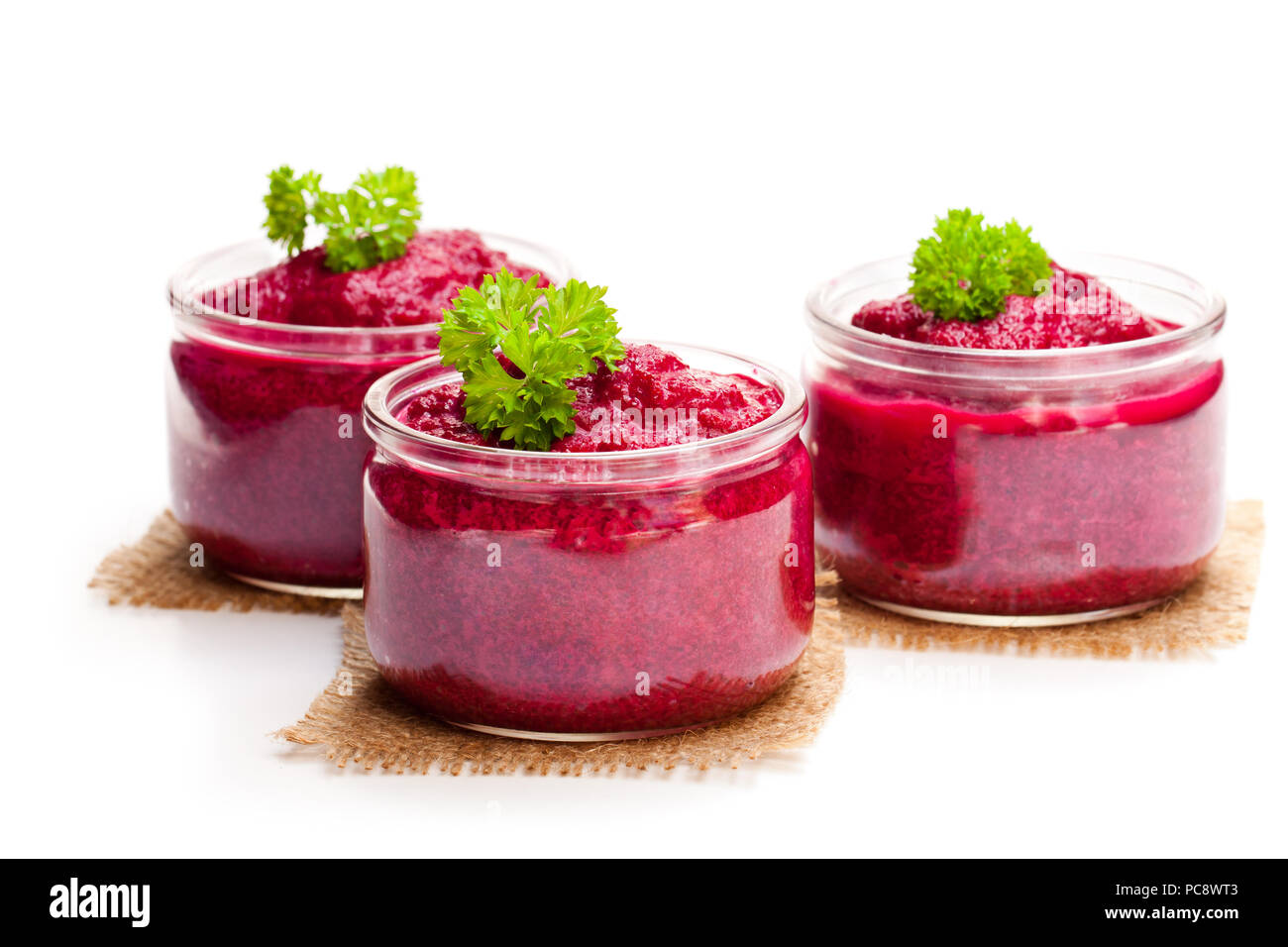 Beetroot puree in glass jars isolated on white Stock Photo - Alamy