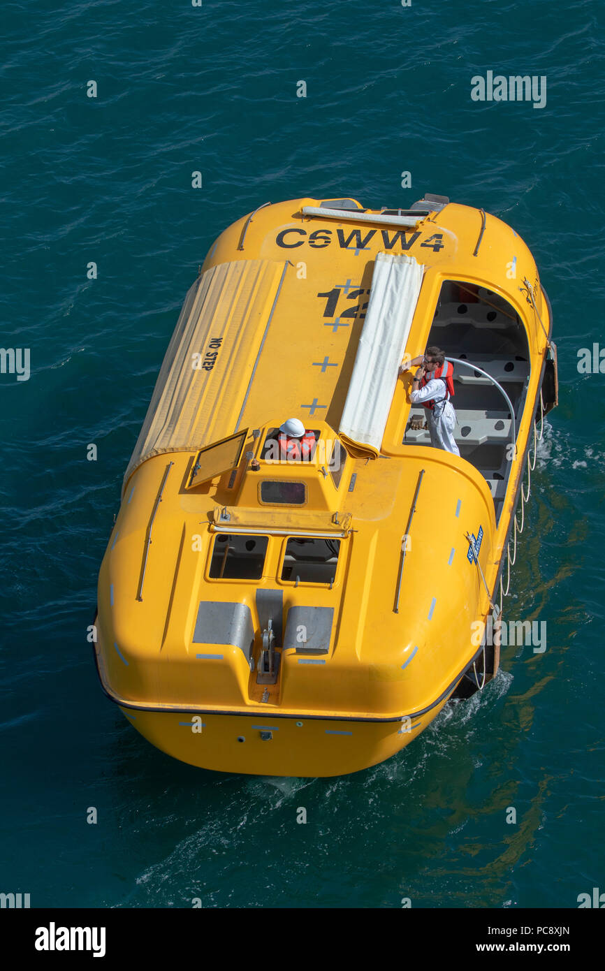 A yellow lifeboat from the Royal Caribbean Independence of the Seas ...