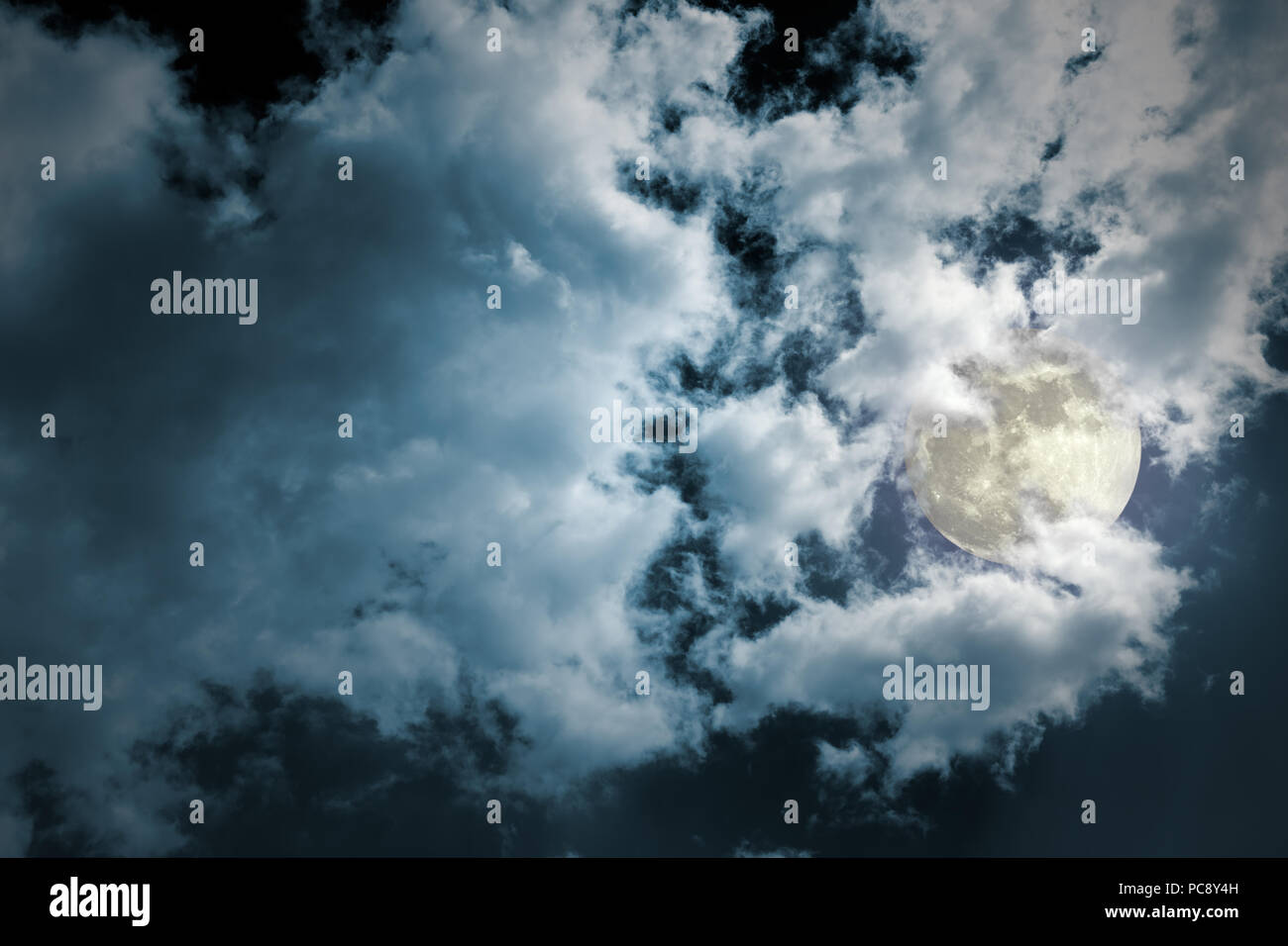 Cloudy moonlit night sky hi-res stock photography and images - Alamy