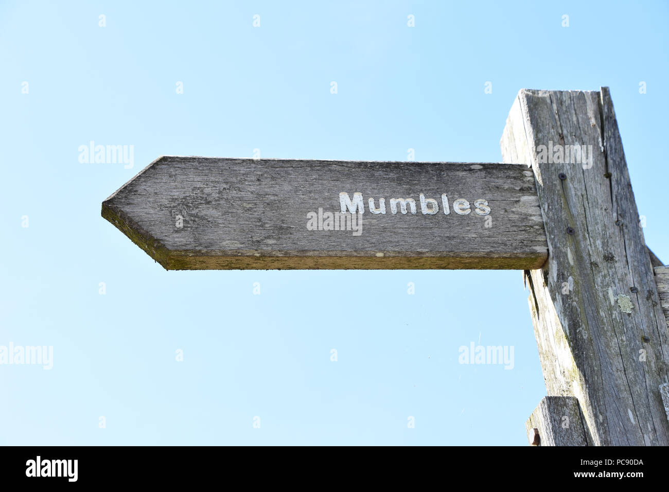 Street sign pointing to Mumbles, Wales. June, 2018 Stock Photo - Alamy