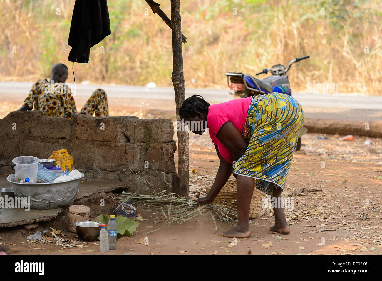 DANKOLI, BENIN - JAN 12, 2017: Unidentified Beninese girl cleans in the ...