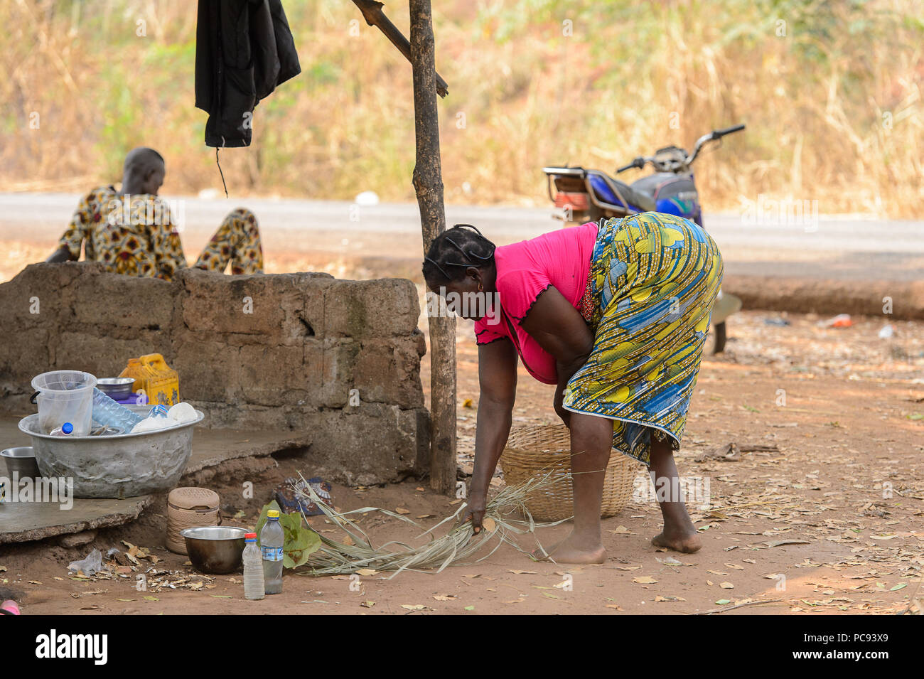 DANKOLI, BENIN - JAN 12, 2017: Unidentified Beninese girl cleans in the ...