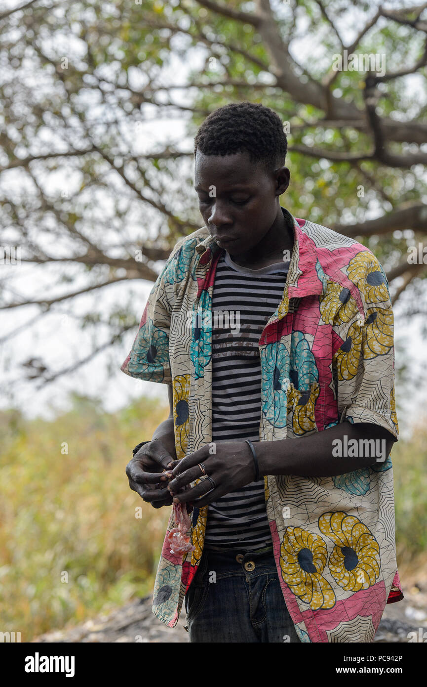 DANKOLI, BENIN - JAN 12, 2017: Unidentified Beninese man in a shirt in ...