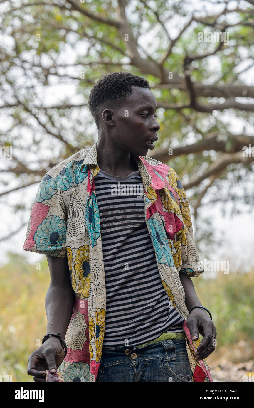 DANKOLI, BENIN - JAN 12, 2017: Unidentified Beninese man in a shirt in ...