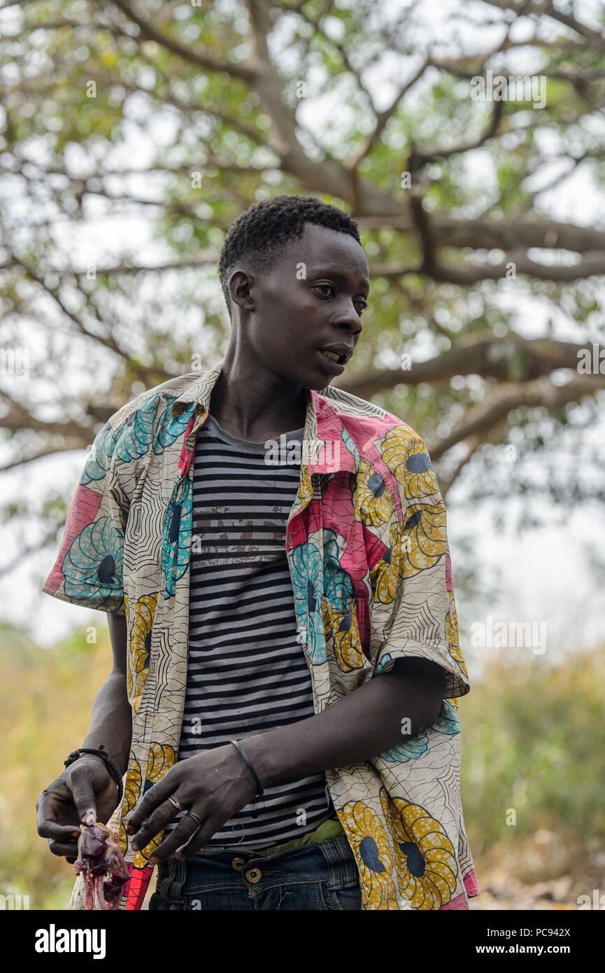 DANKOLI, BENIN - JAN 12, 2017: Unidentified Beninese man in a shirt in ...