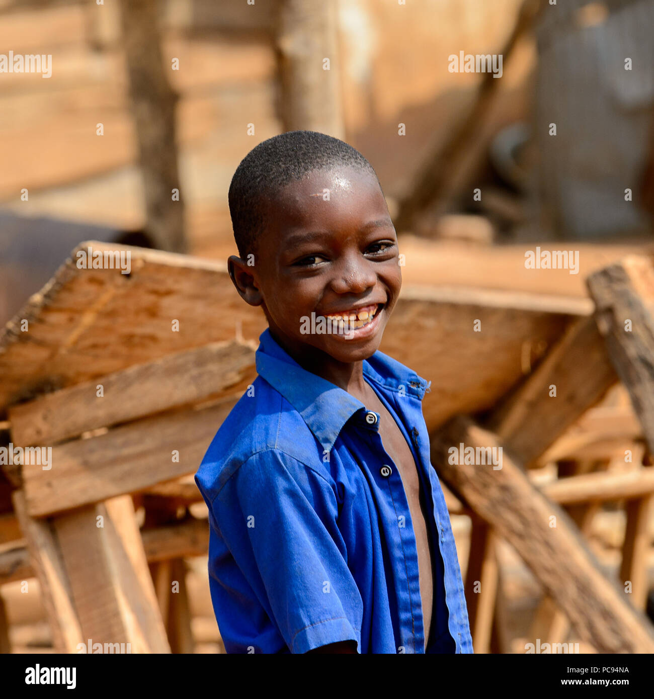 PIRA, BENIN - JAN 12, 2017: Unidentified Beninese little boy in a blue ...