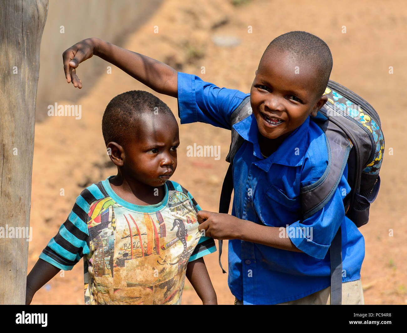 PIRA, BENIN - JAN 12, 2017: Unidentified Beninese little boy in a blue ...