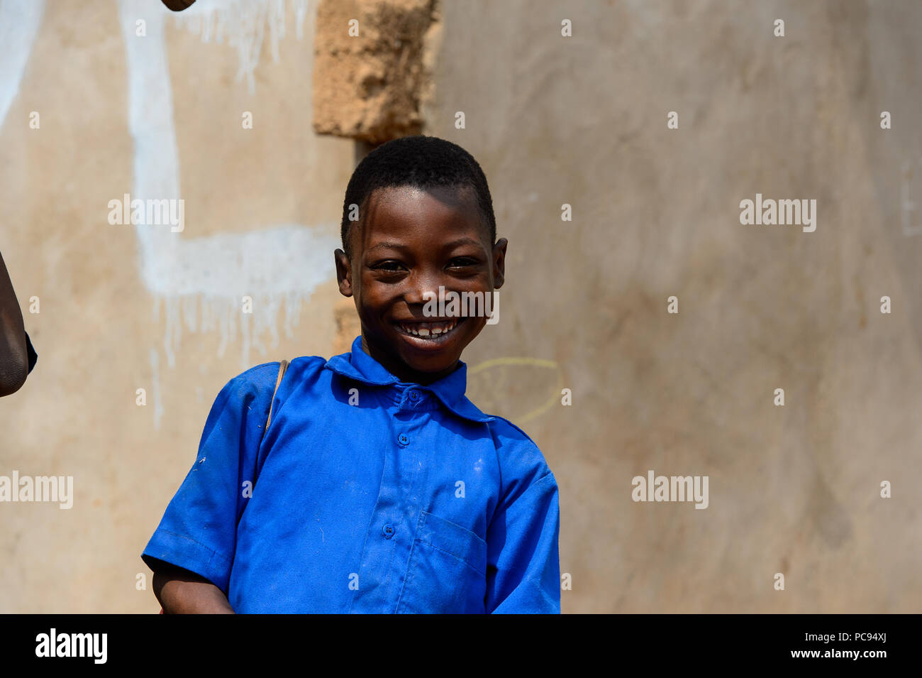 PIRA, BENIN - JAN 12, 2017: Unidentified Beninese little boy in a blue ...
