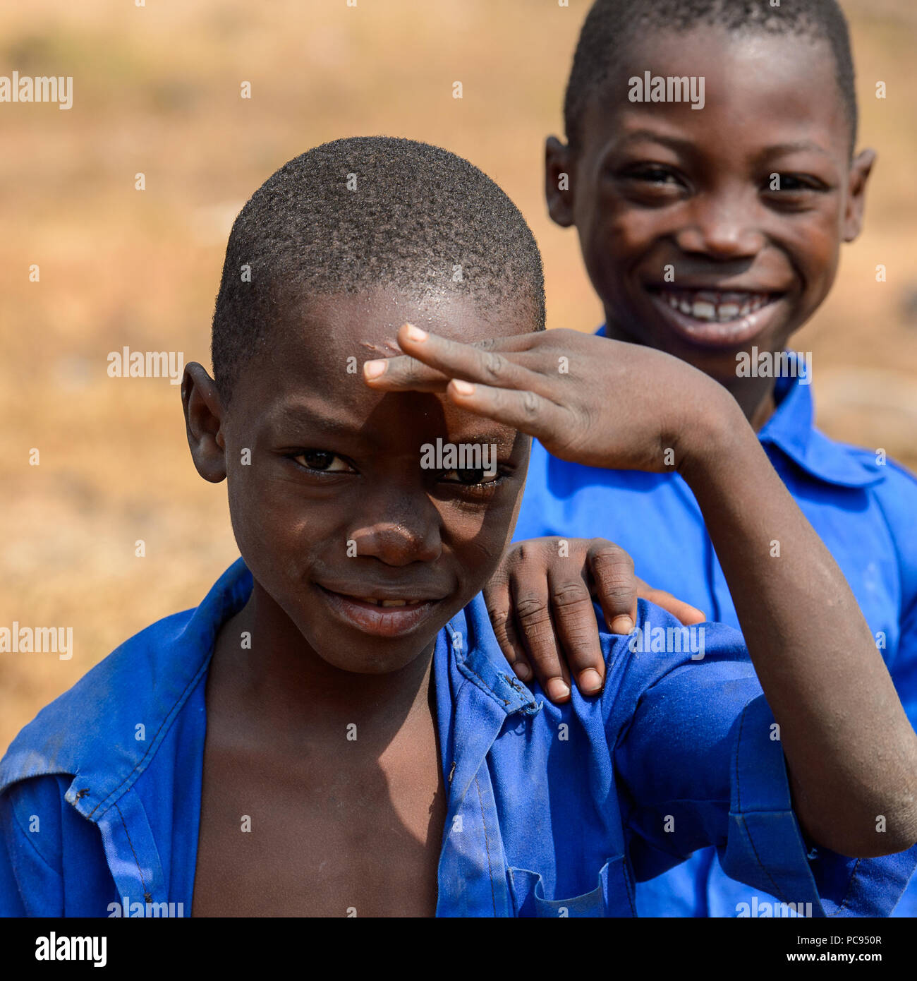 PIRA, BENIN - JAN 12, 2017: Unidentified Beninese little boy in a blue ...