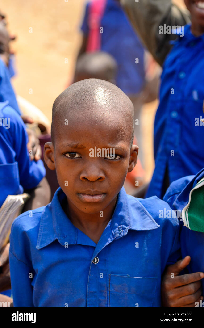 PIRA, BENIN - JAN 12, 2017: Unidentified Beninese little boy in a blue ...