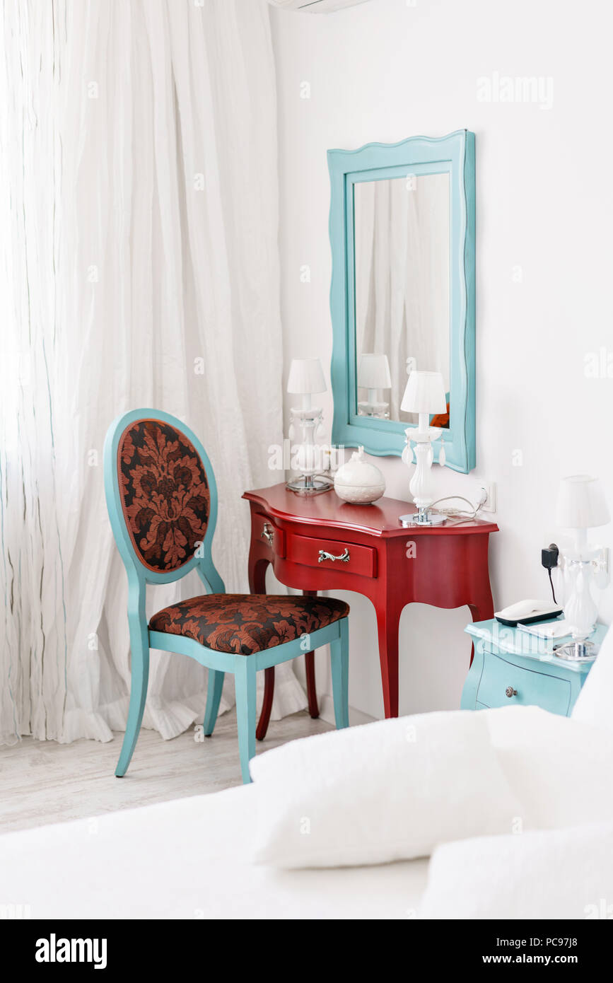 interior hotel apartment, comfortable room, mirror and desk. folder for ...