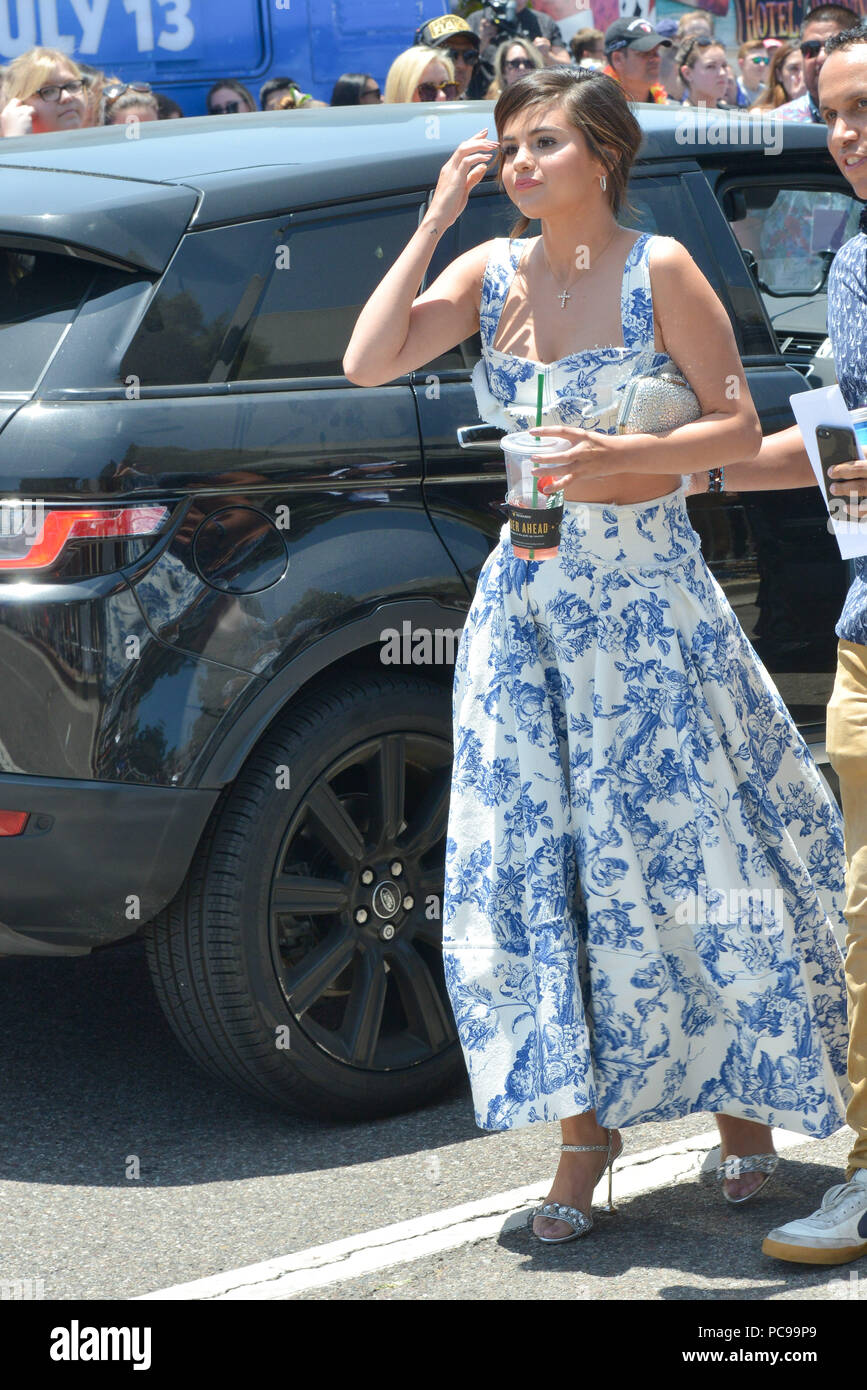 Selena Gomez arrives for the 'Hotel Transylvania 3' premiere drinking a ...
