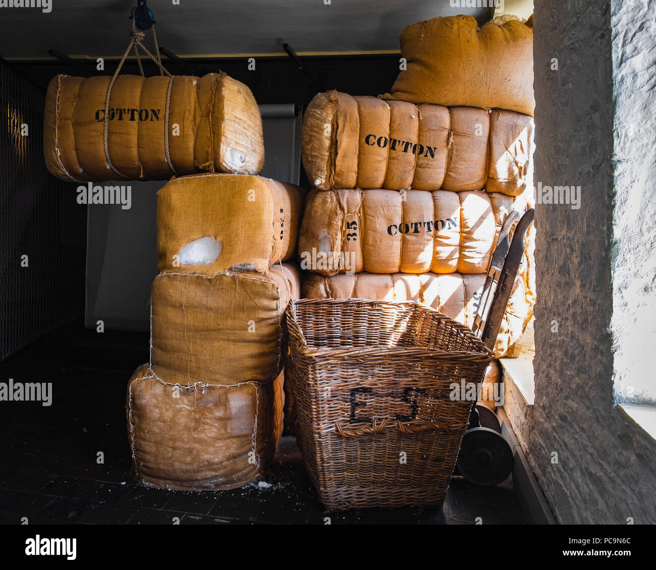 Large bales of cotton in the warehouse room Stock Photo - Alamy