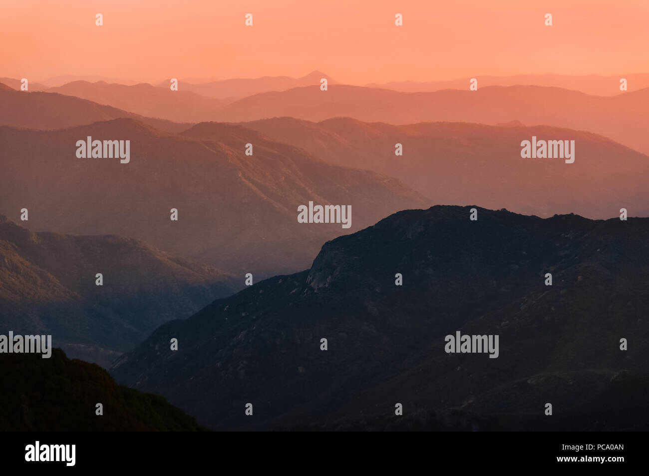 Sunset over mountain ranges of Sierra Nevada in California. Beautiful ...