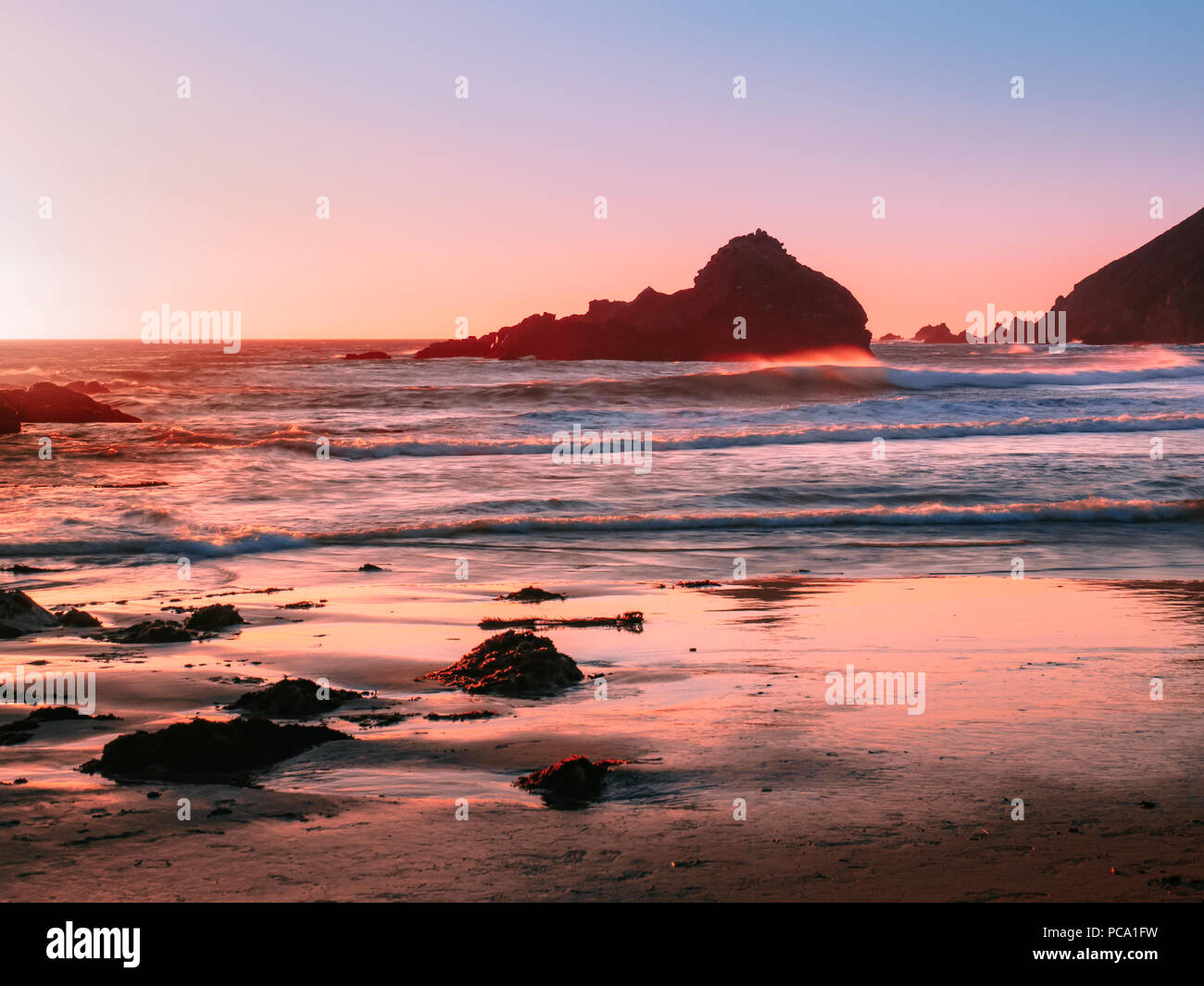 Jagged coastal rocks on the Pacific Coast at dusk. Shot taken at ...