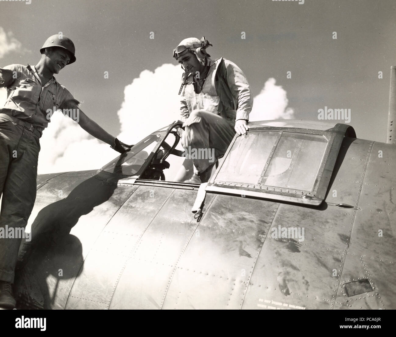 Pilot of first plane in plane - Tarawa Stock Photo - Alamy