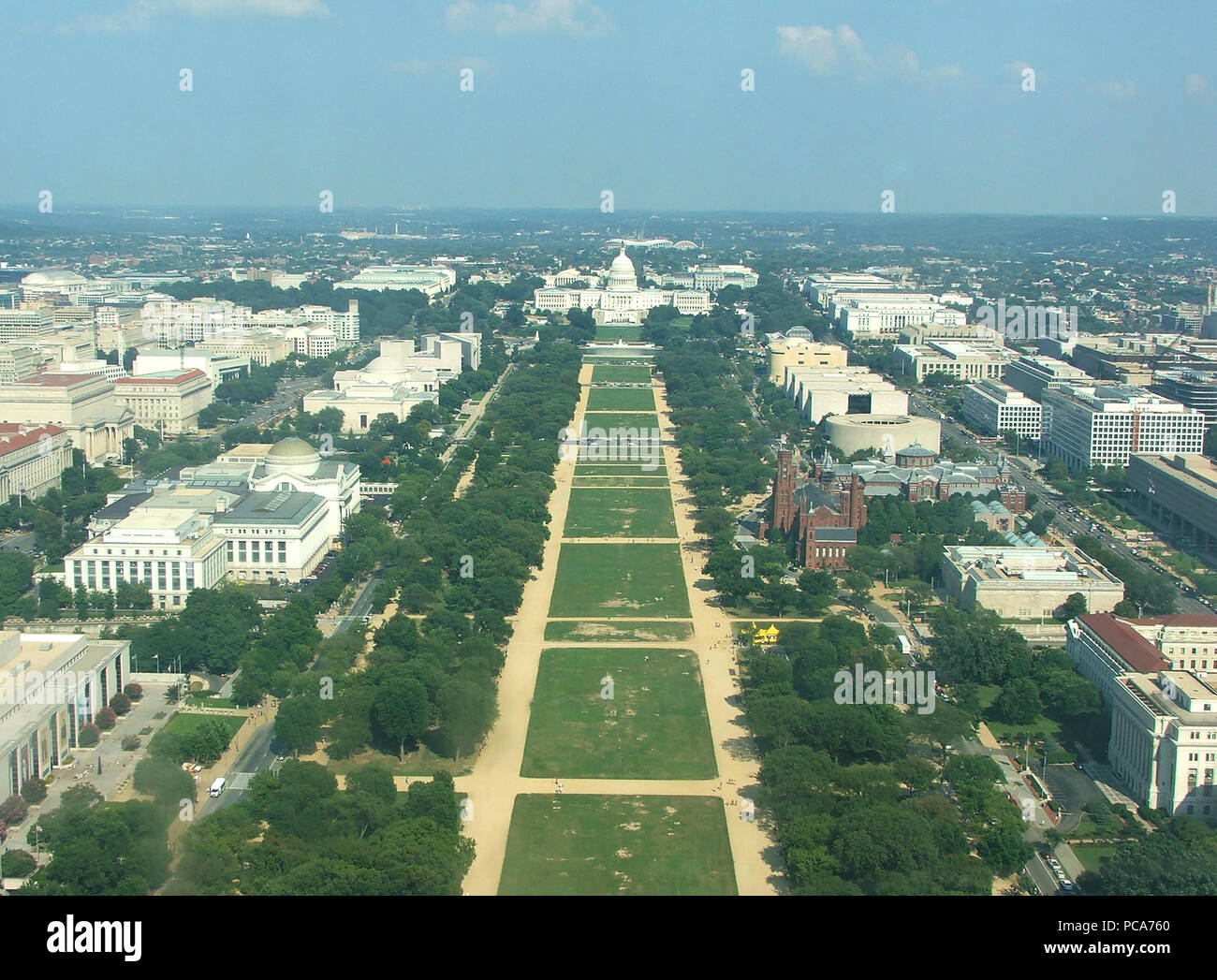 The Mall makes a broad green pathway with the U.S. Capitol Building at ...