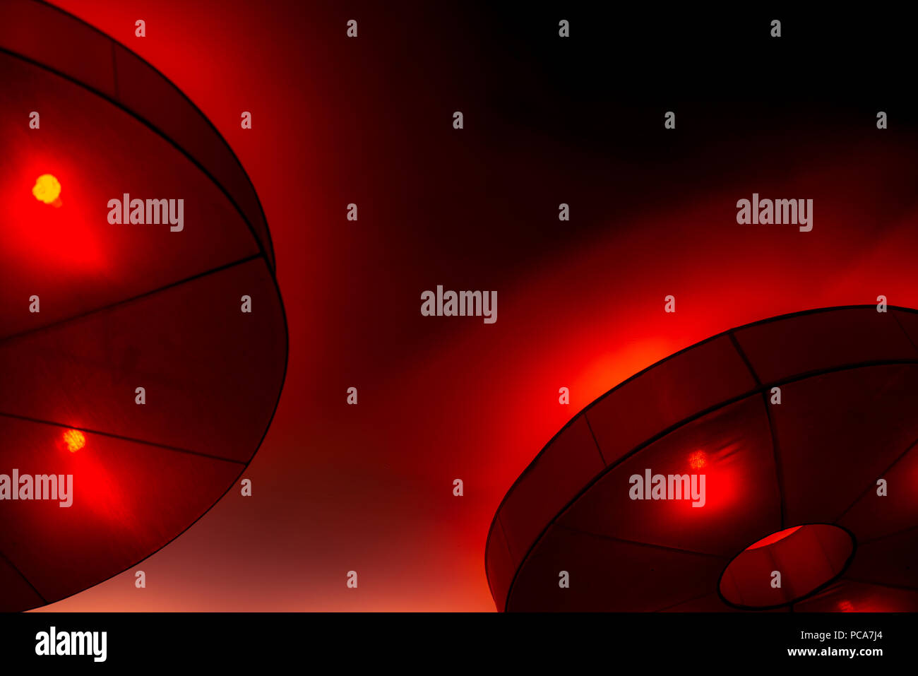 Interior ceiling red lights on dark background at night. Interior ...