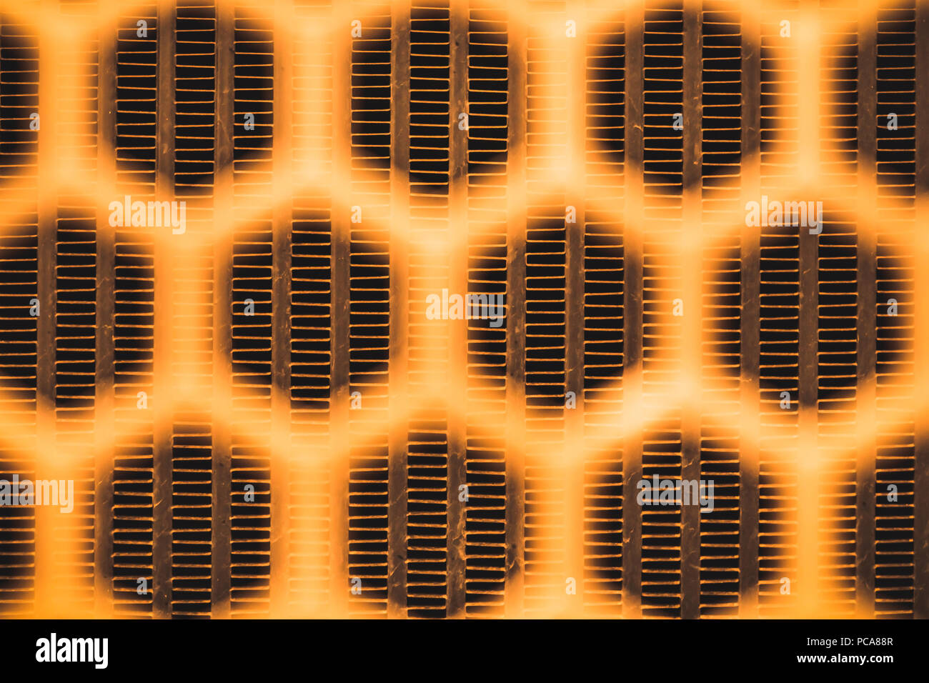 yellow front Grille of the new farm tractor Stock Photo - Alamy