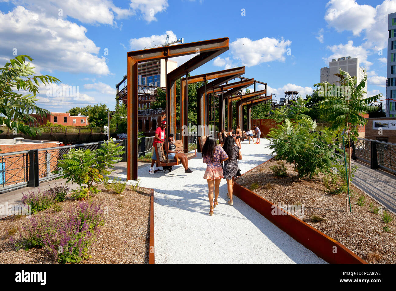 People enjoying a nice summer day at the Rail Park in Philadelphia ...
