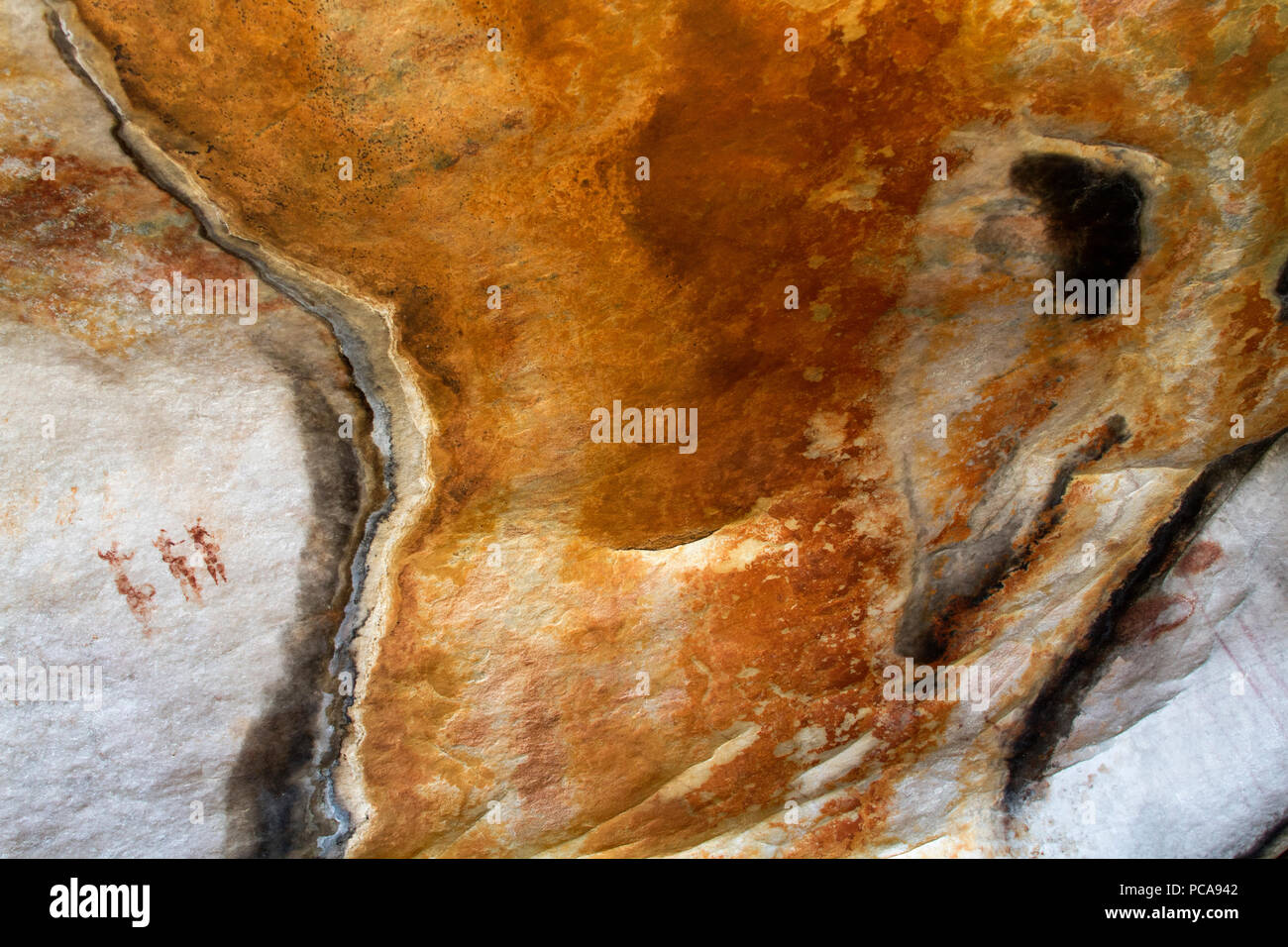 Rock art with colourful patterns Stock Photo - Alamy