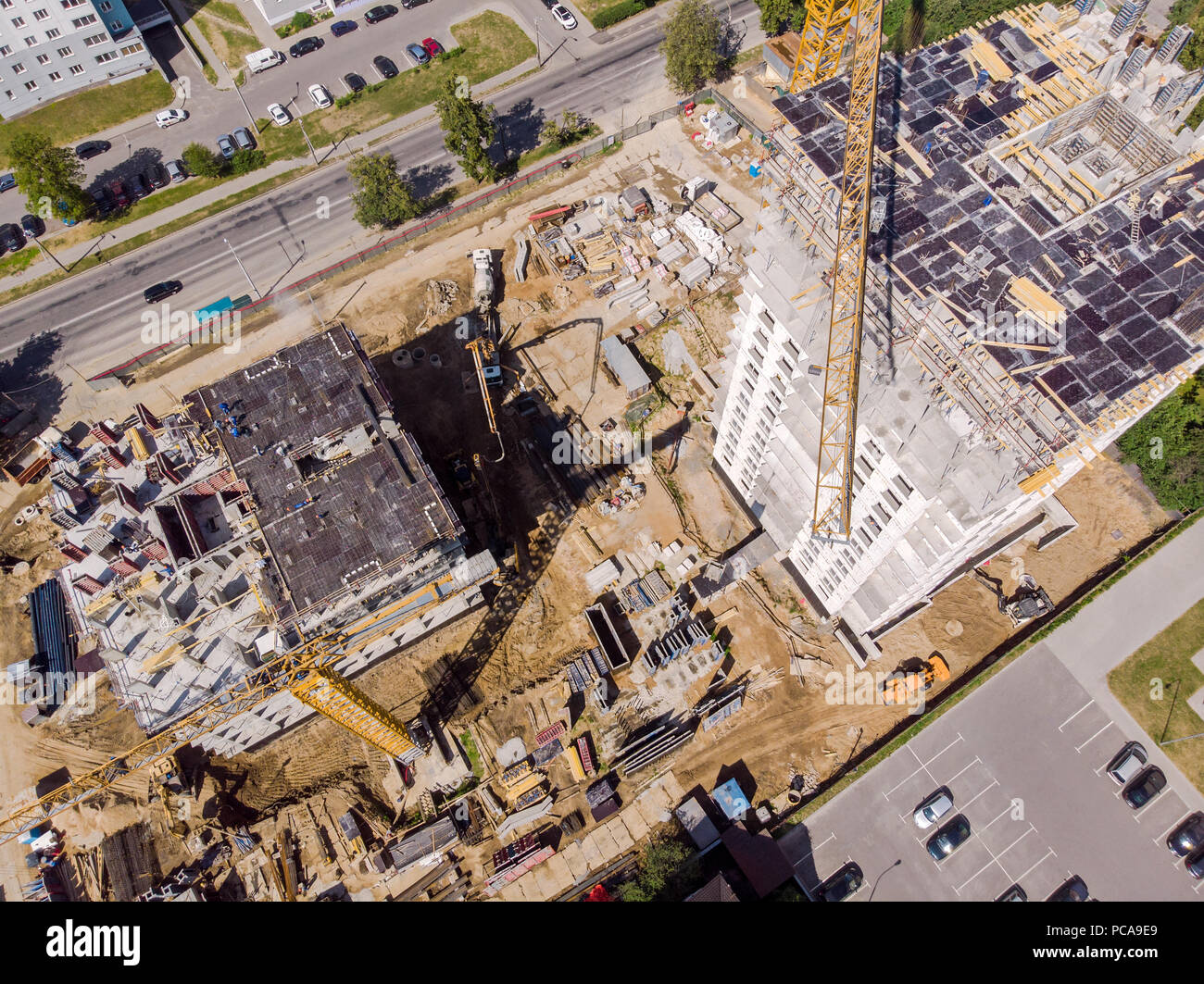 aerial photography of industrial area. new apartment building under ...