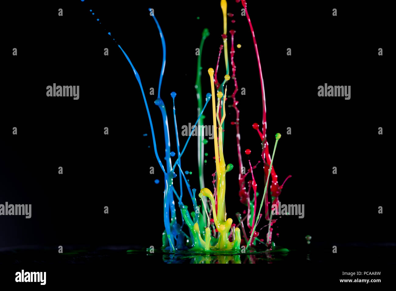 abstract color splash isolated on black background Stock Photo - Alamy