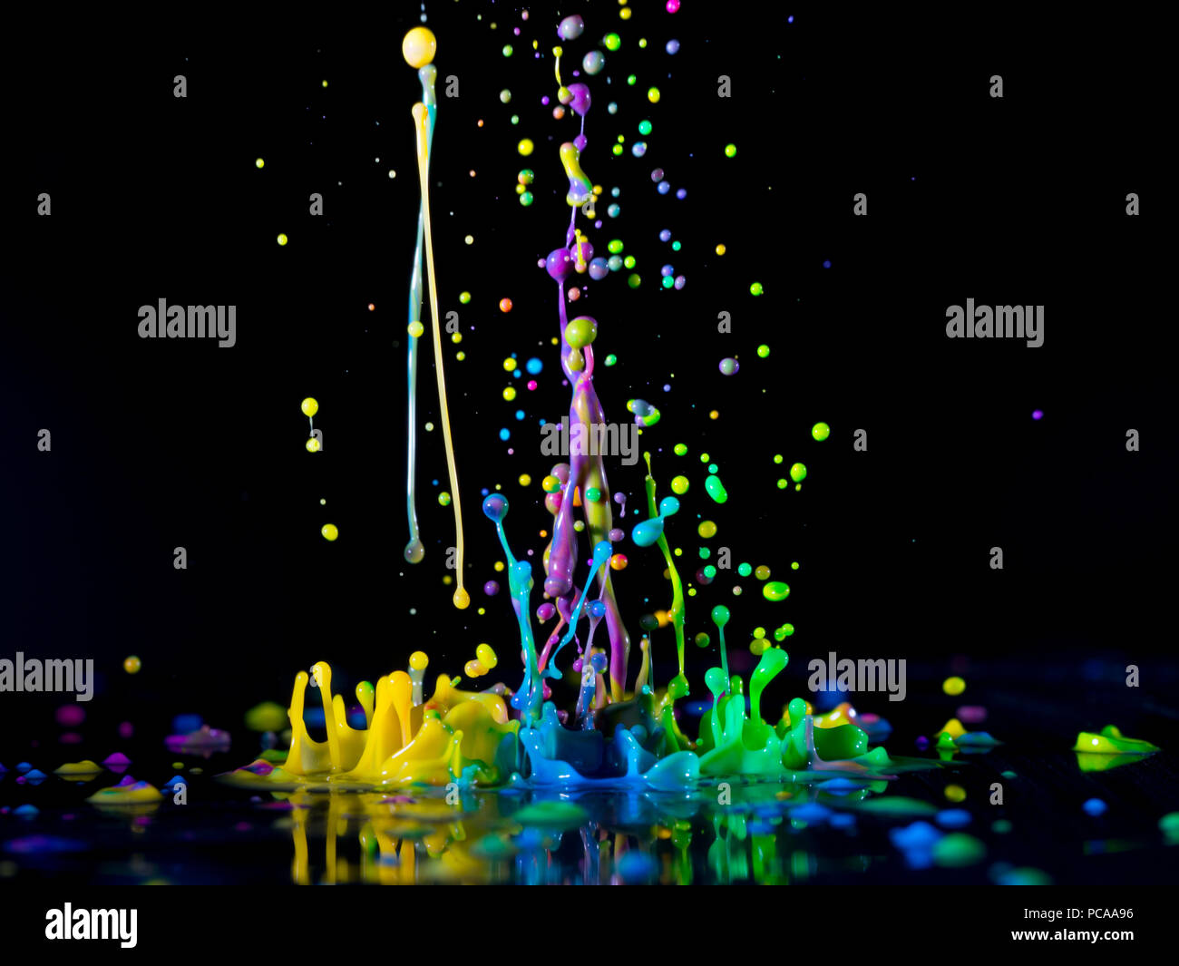 abstract color splash isolated on black background Stock Photo - Alamy