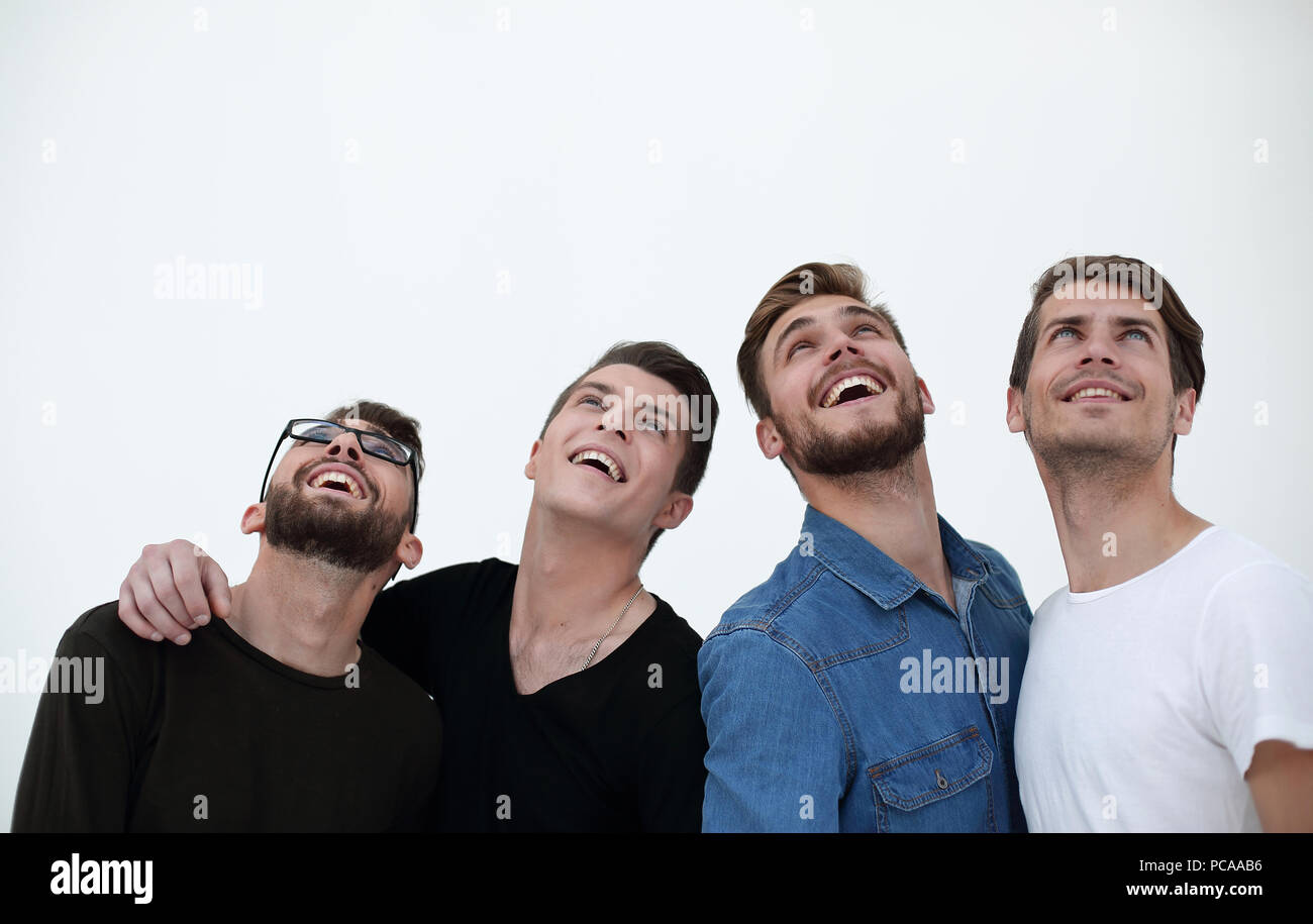 Happy positive group of men looking up with dreamy expression Stock ...