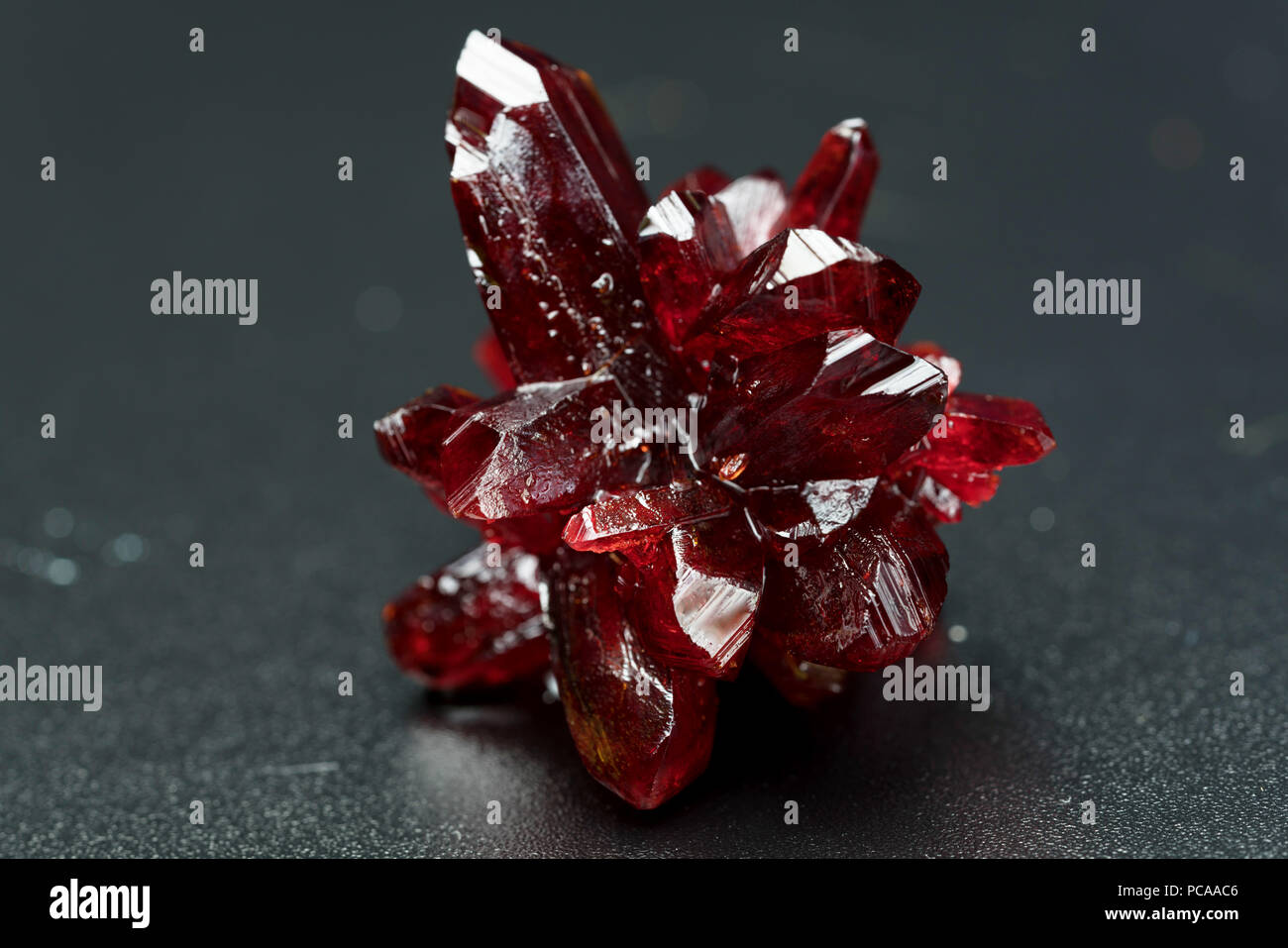 Red natural crystal. Natural mineral Stock Photo - Alamy
