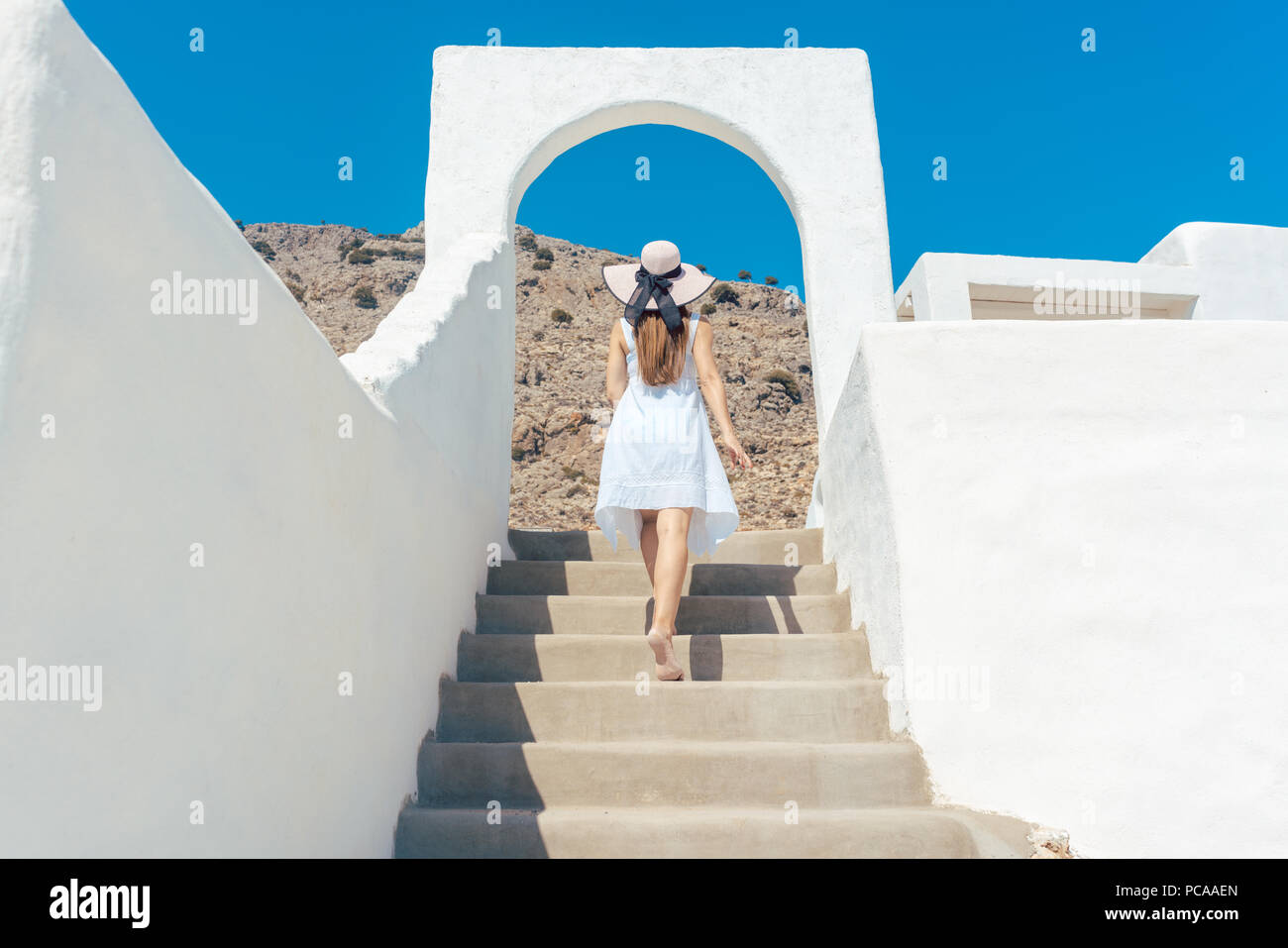Woman climbing stairs hi-res stock photography and images - Alamy