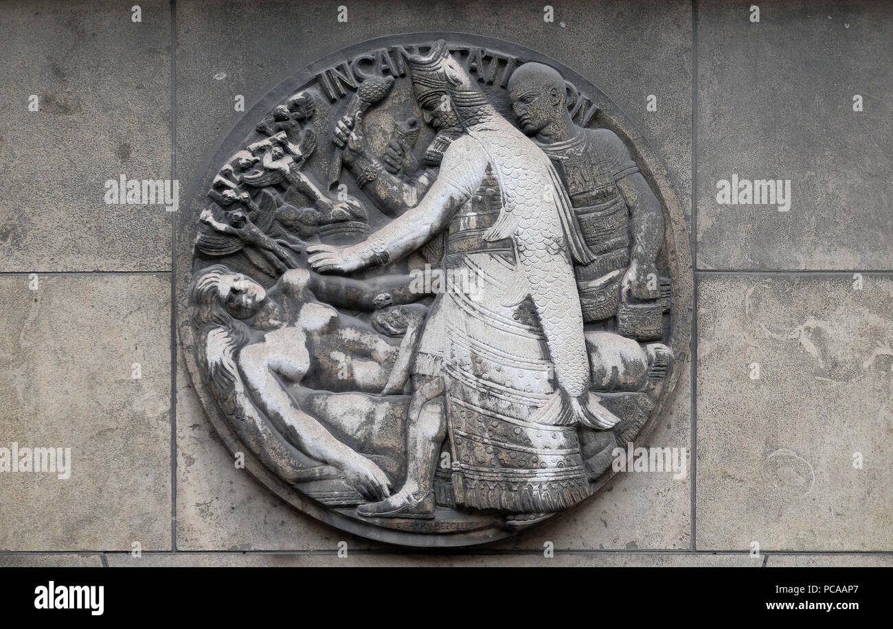 Incantation. Stone relief at the building of the Faculte de Medicine ...