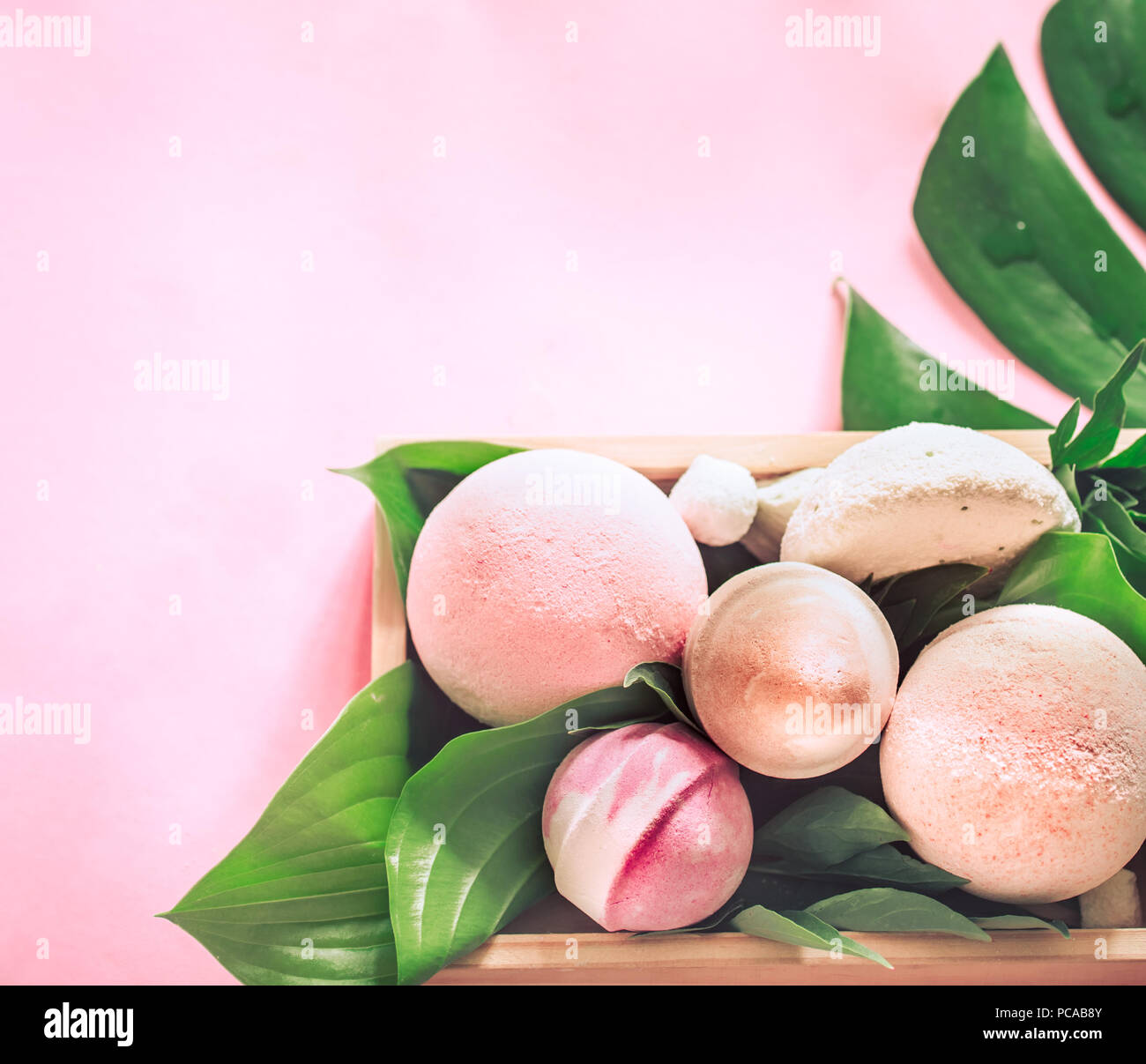 salt bombs for a spa bath still life on a colored background with ...