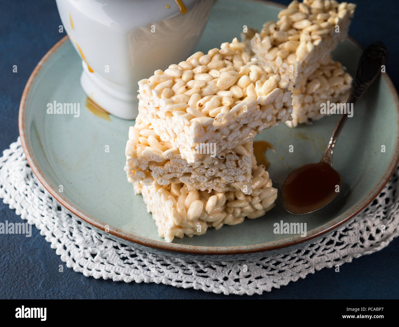 Sweet puffed rice marshmallow bars served with salted caramel Stock ...
