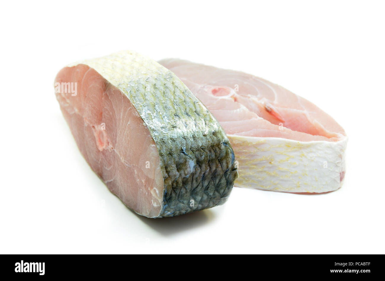 Threadfin fish fillet isolated on white background Stock Photo - Alamy