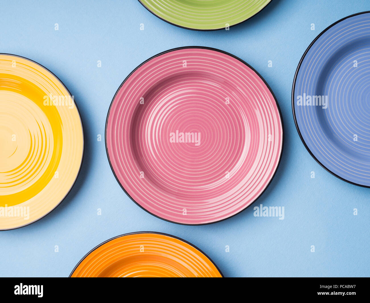 Colorful ceramic dishes. Flat lay tableware set concept Stock Photo - Alamy