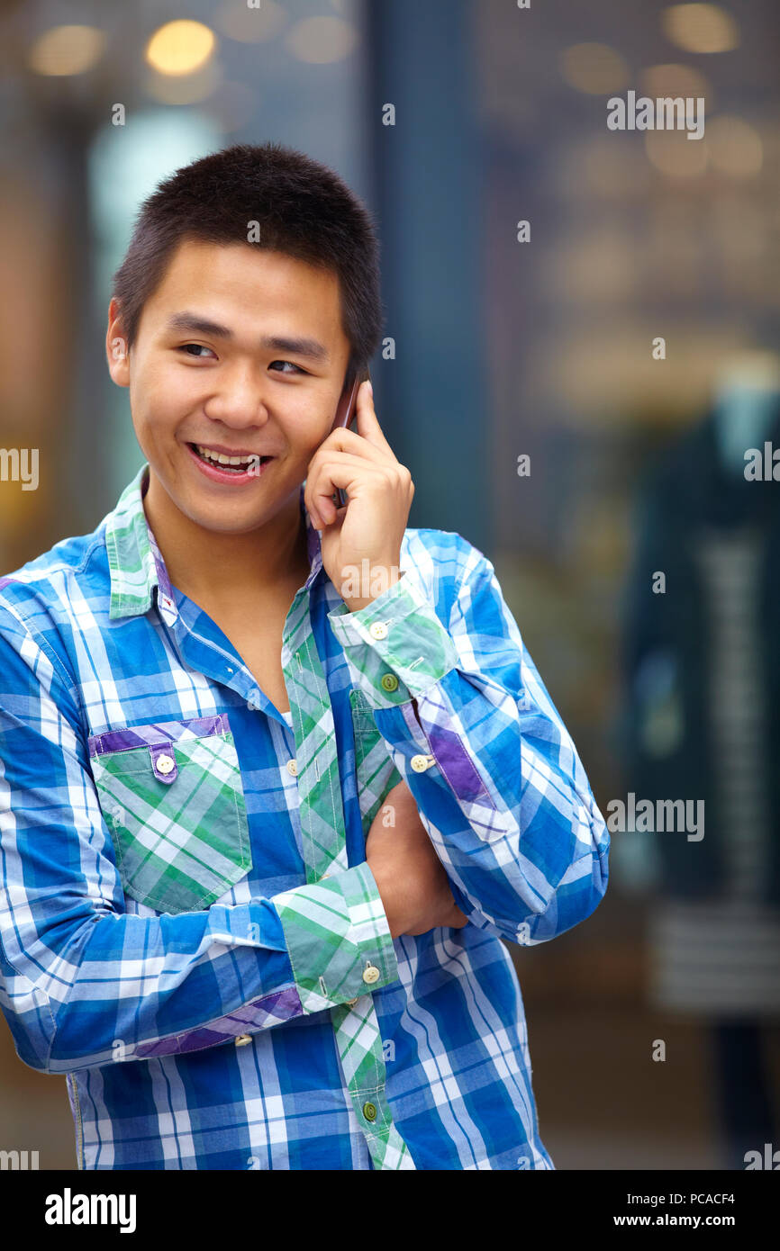 Asian chinese man teen city hi-res stock photography and images - Alamy