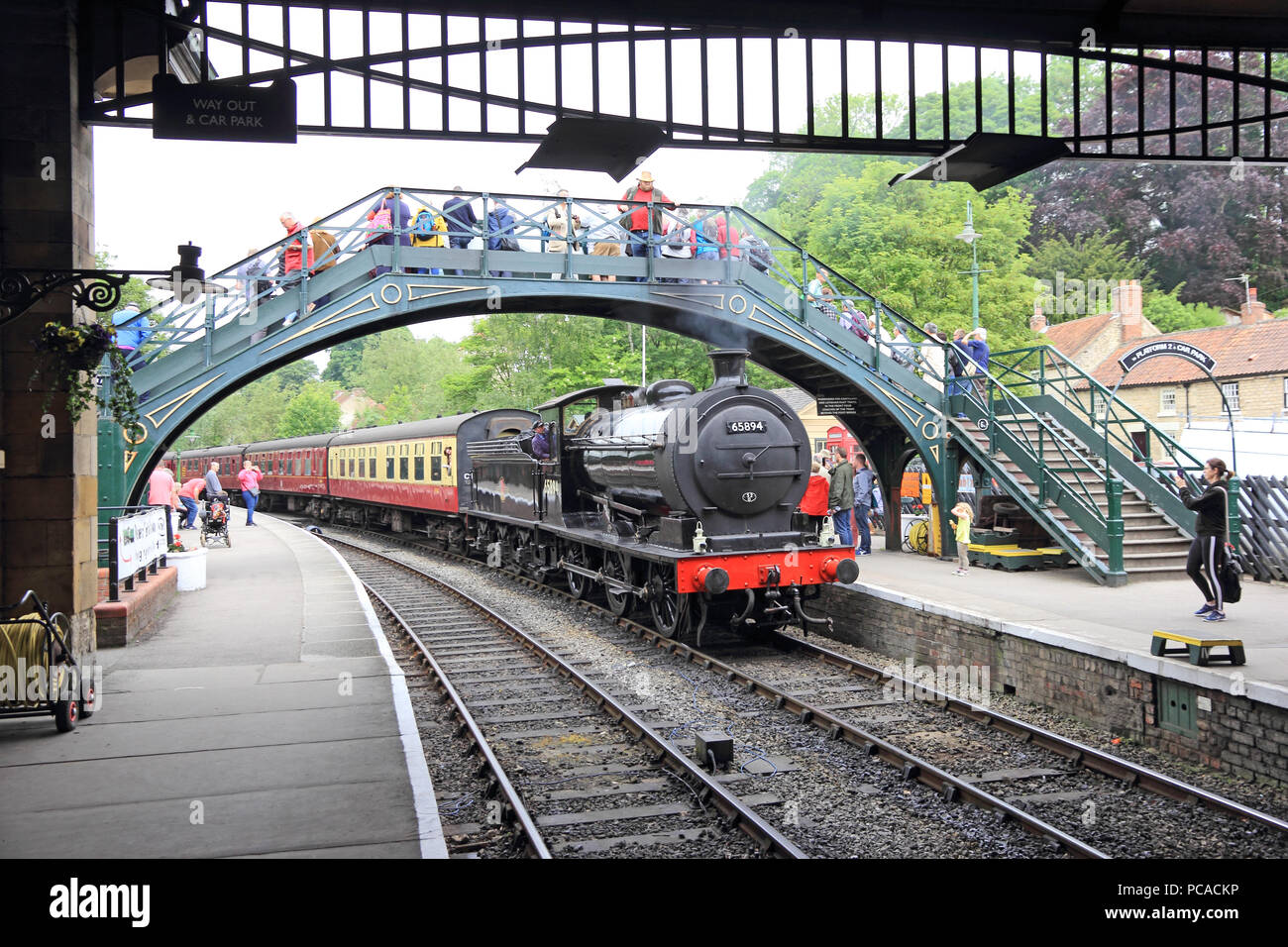 Steam locomotive 65894 arriving at station, Pickering, North Yorkshire ...