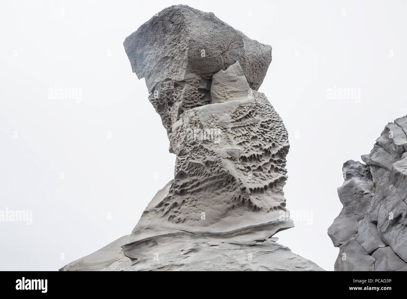 view of volcanic rock formation at bridge between the continents ...